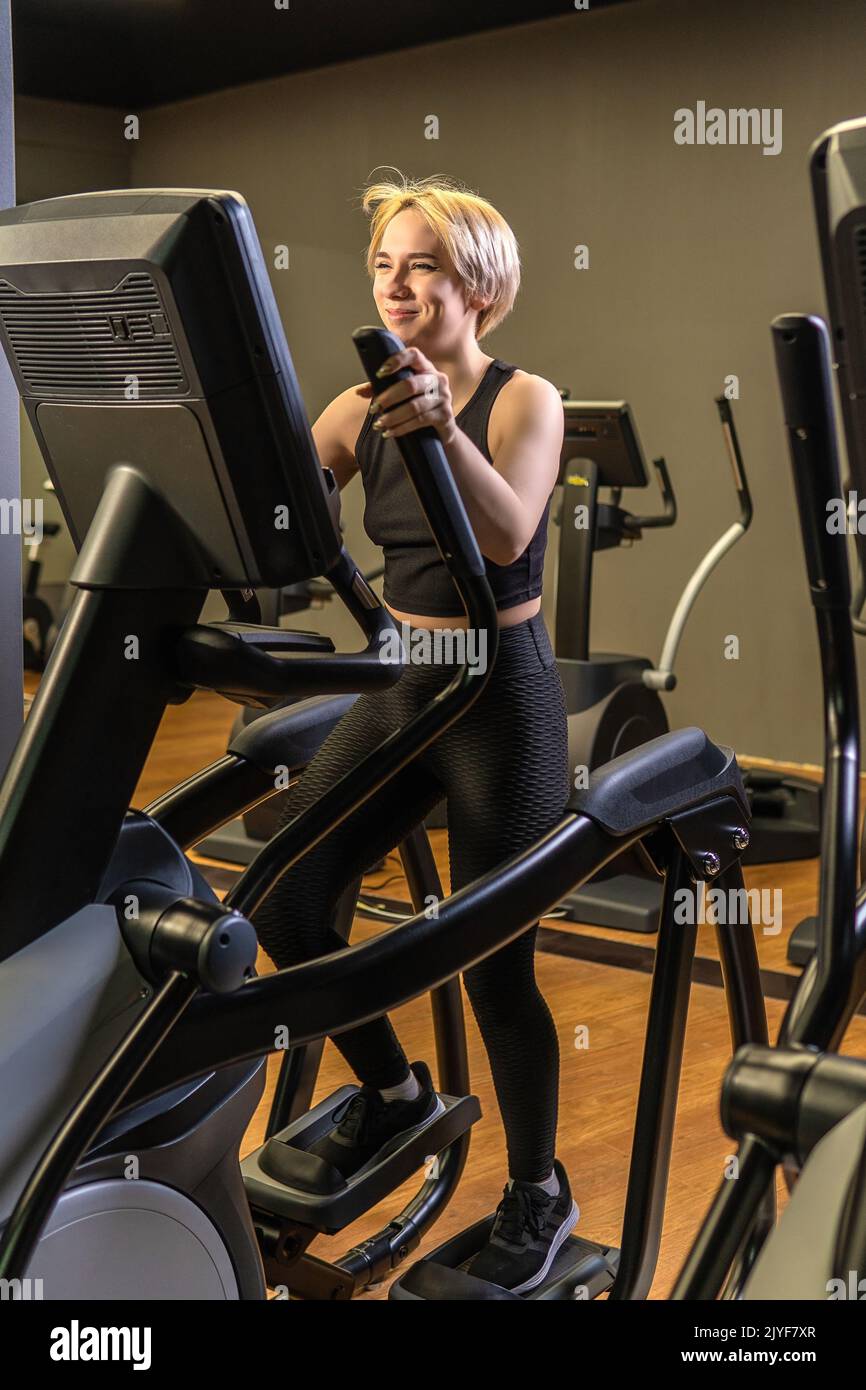 Elliptical trainer young sport health, In the afternoon fit exercise ...