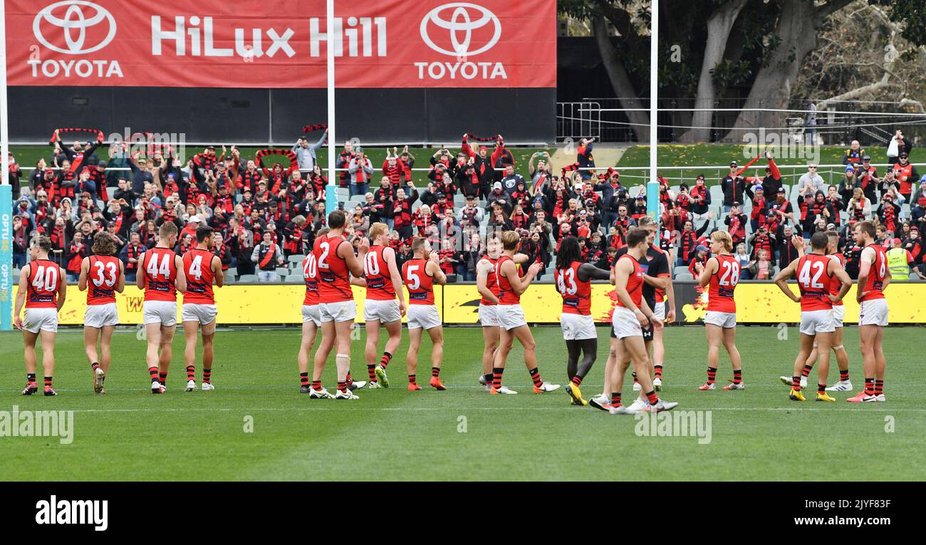 Bombers players celebrate with the crowd after the Round 8 AFL match ...
