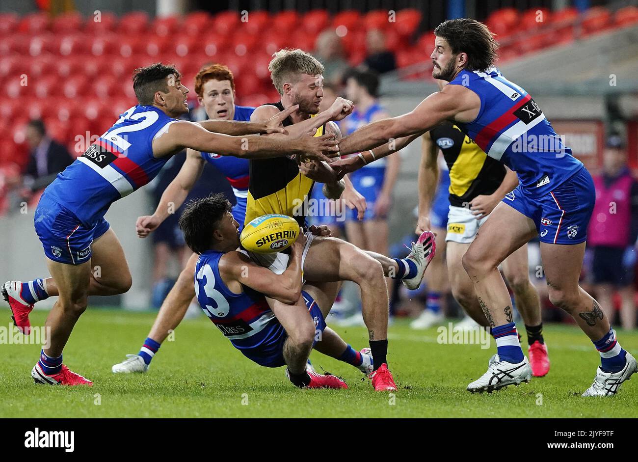 Nathan Broad of the Tigers is tackled during the Round 9 AFL match ...