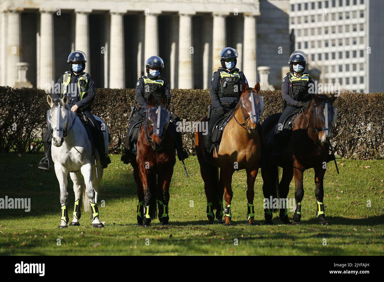 Police are seen at the Shrine of Remembrance in Melbourne, Friday, July ...