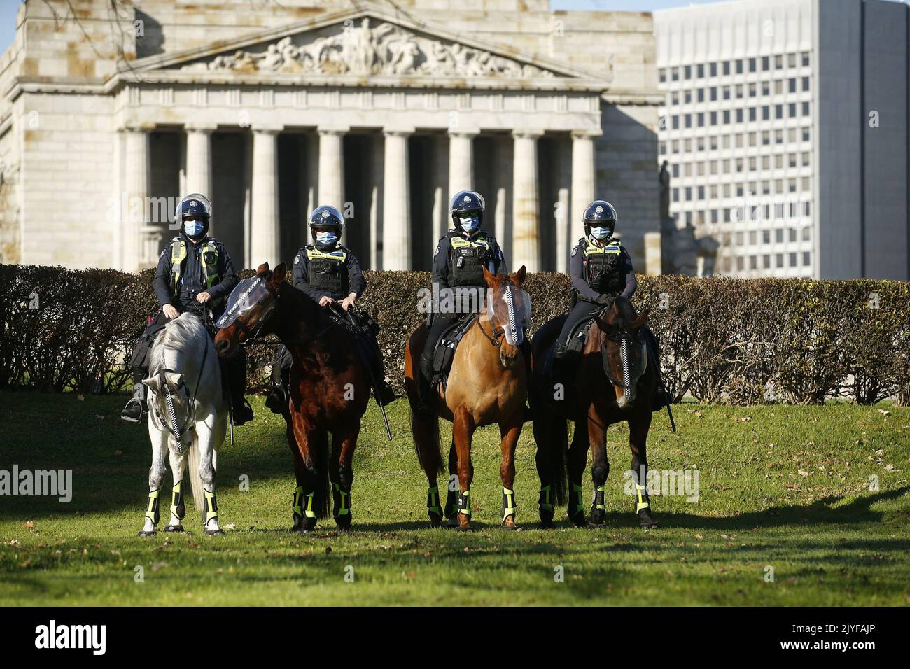 Police are seen at the Shrine of Remembrance in Melbourne, Friday, July ...
