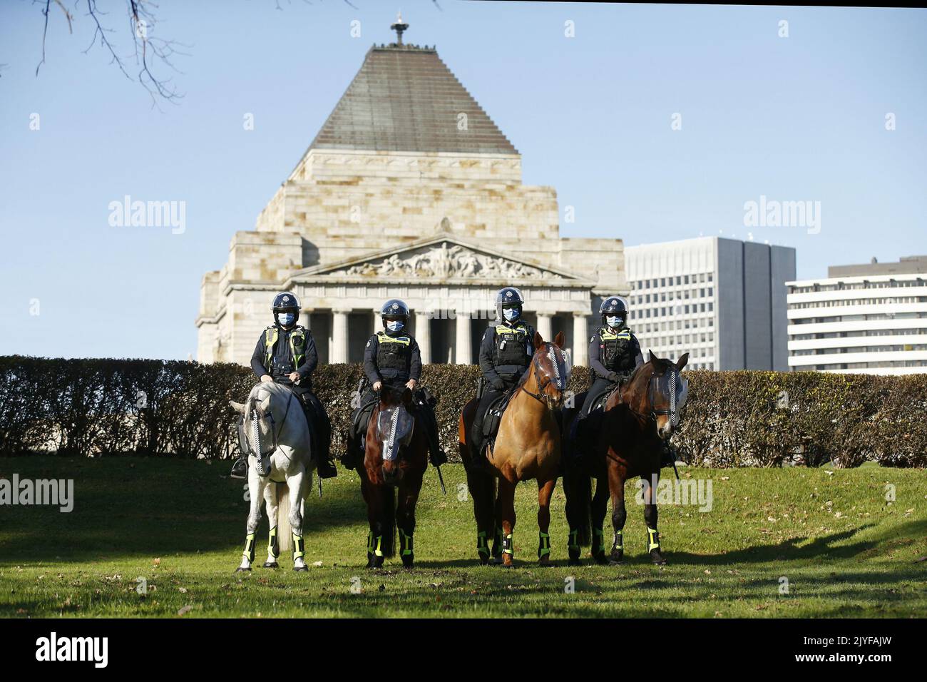 Police are seen at the Shrine of Remembrance in Melbourne, Friday, July ...