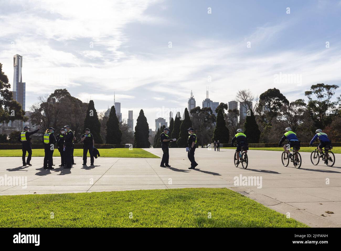 Police are seen at the Shrine of Remembrance in Melbourne, Friday, July ...