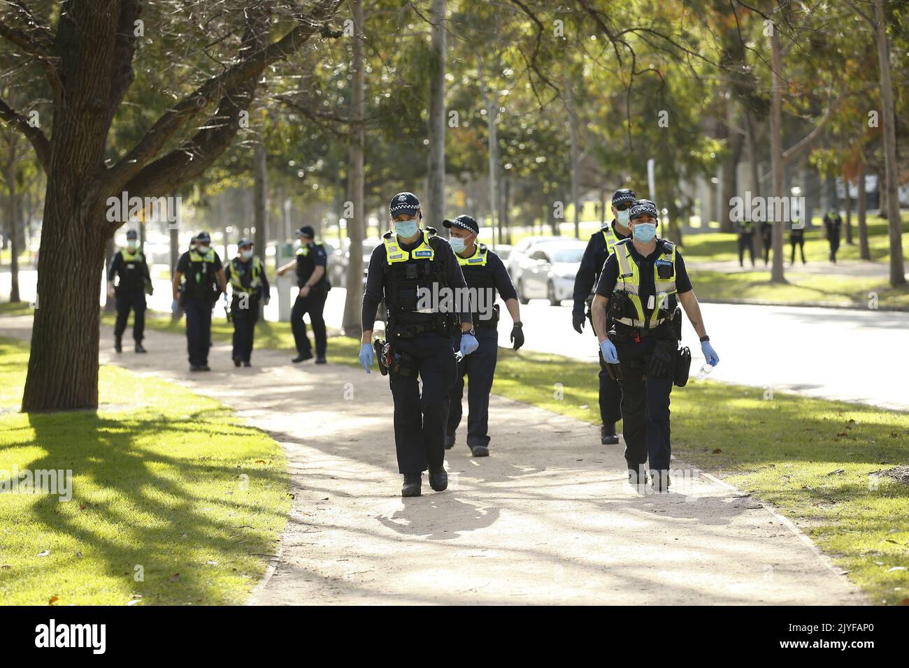 Police are seen at the Shrine of Remembrance in Melbourne, Friday, July ...
