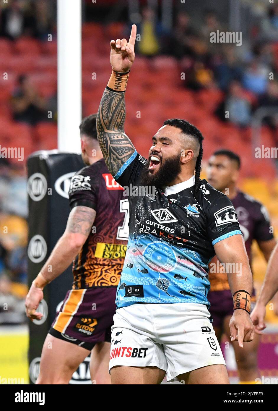 Siosifa Talakai of the Sharks celebrates scoring a try during the Round ...