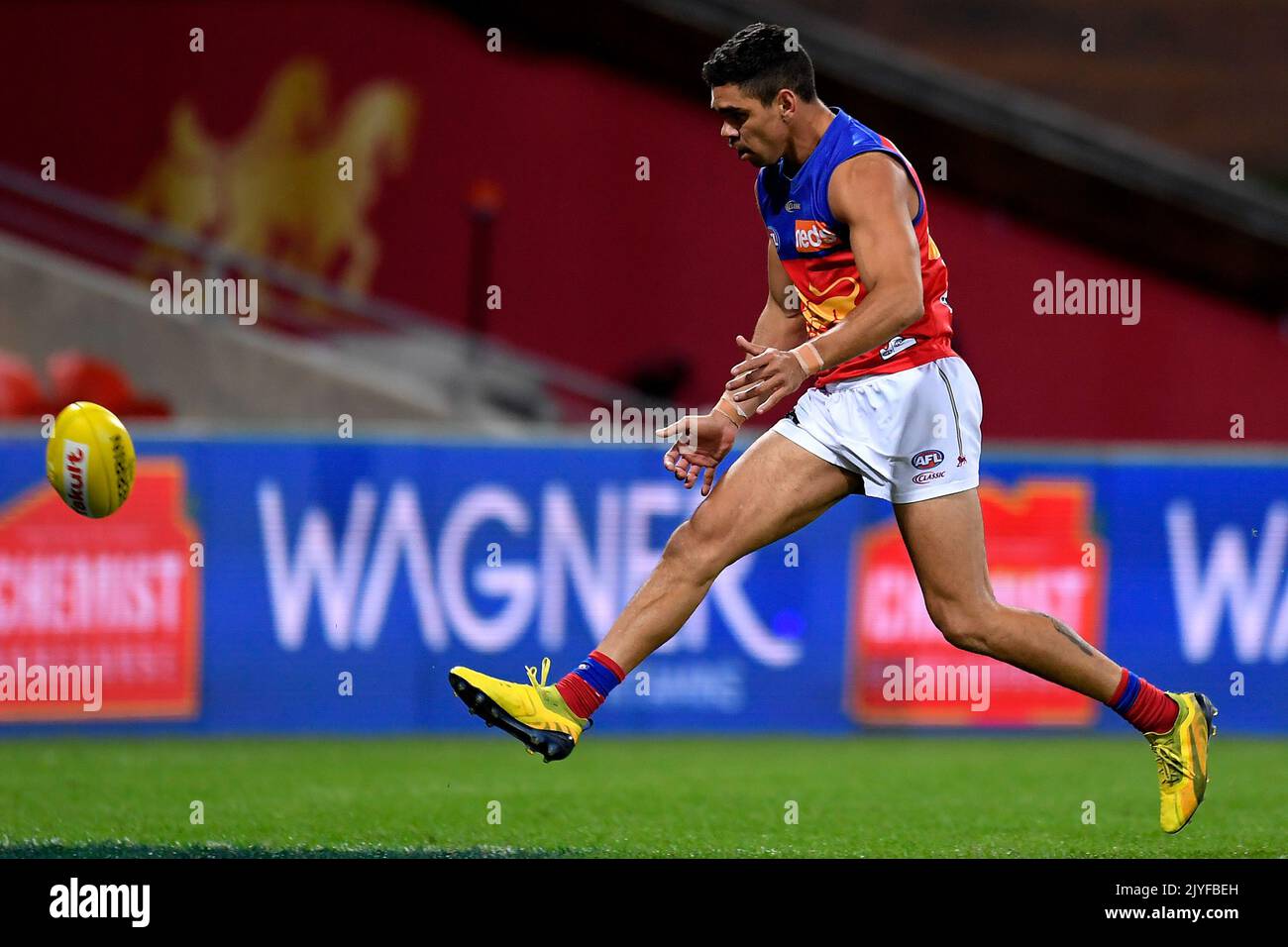 Charlie Cameron of the Lions kicks a goal during the Round 9 AFL match ...