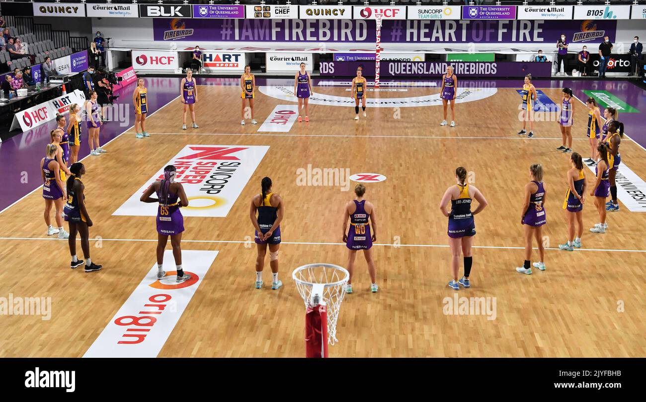 Firebirds and Lightning players are seen lined up together before the ...