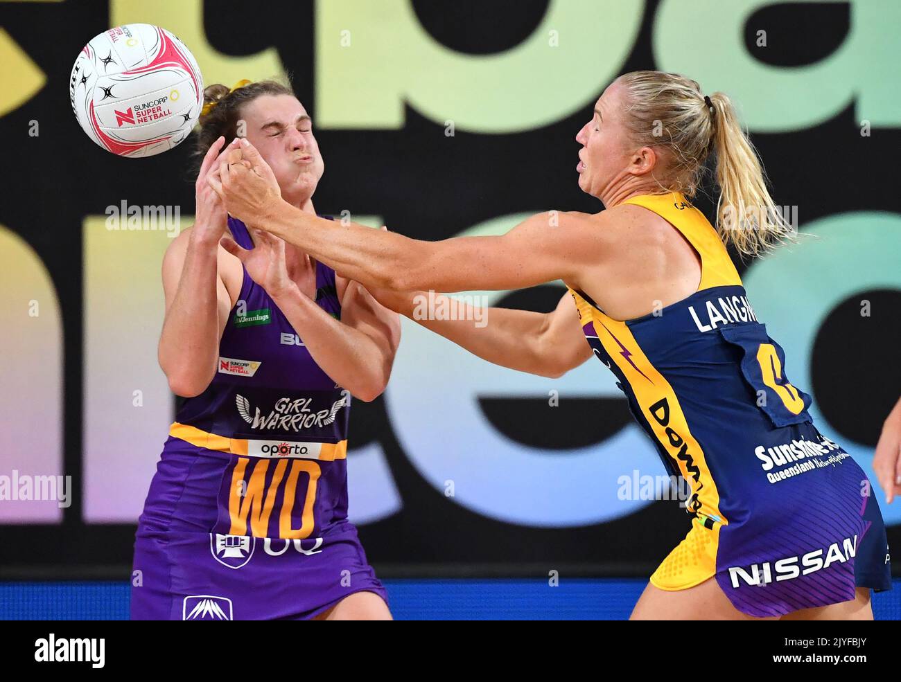 Gabi Simpson (left) of the Firebirds contests for the ball against ...