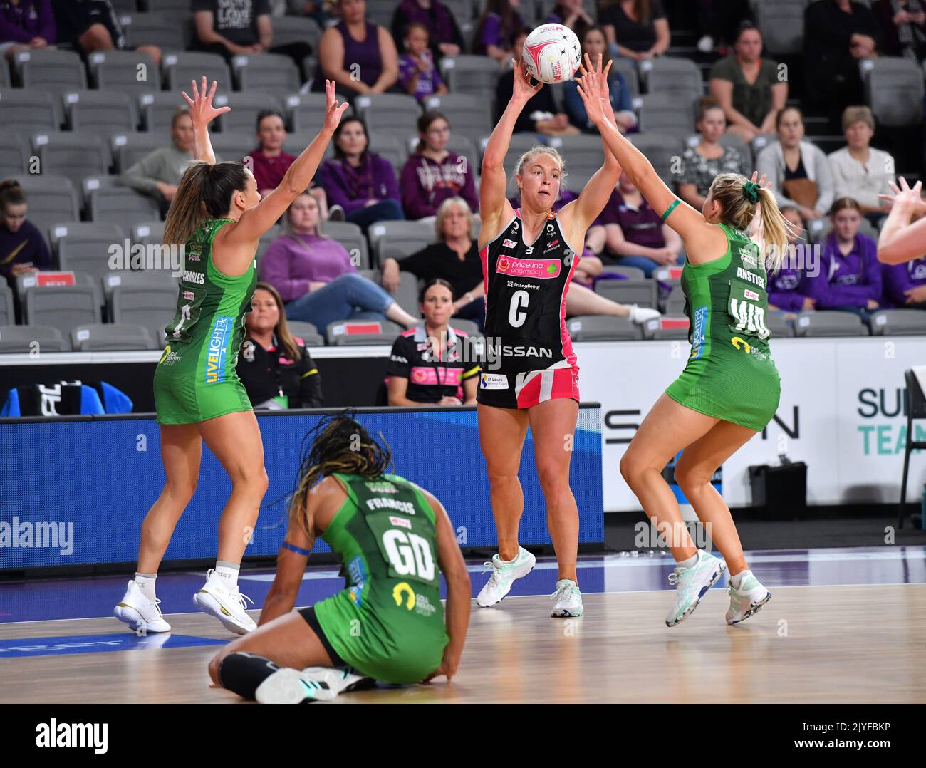 Hannah Petty (centre) of the Thunderbirds in action during the Round 1 ...