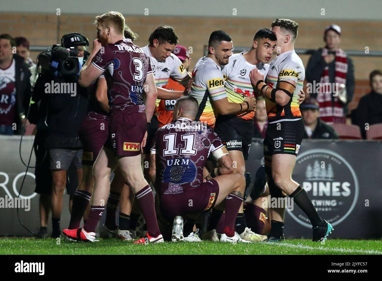 Charlie Staines of the Panthers celebrates scoring a try with team ...