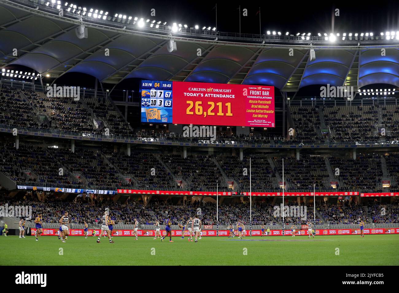 A crowd attendance of 26,211 is displayed during the Round 9 AFL match ...