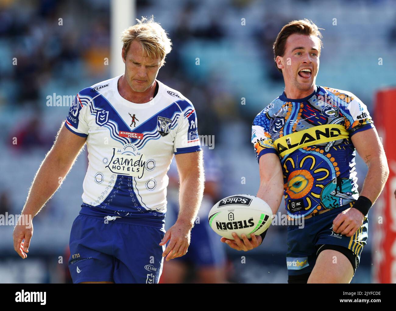 Clint Gutherson of the Eels celebrates scoring a try during the Round ...