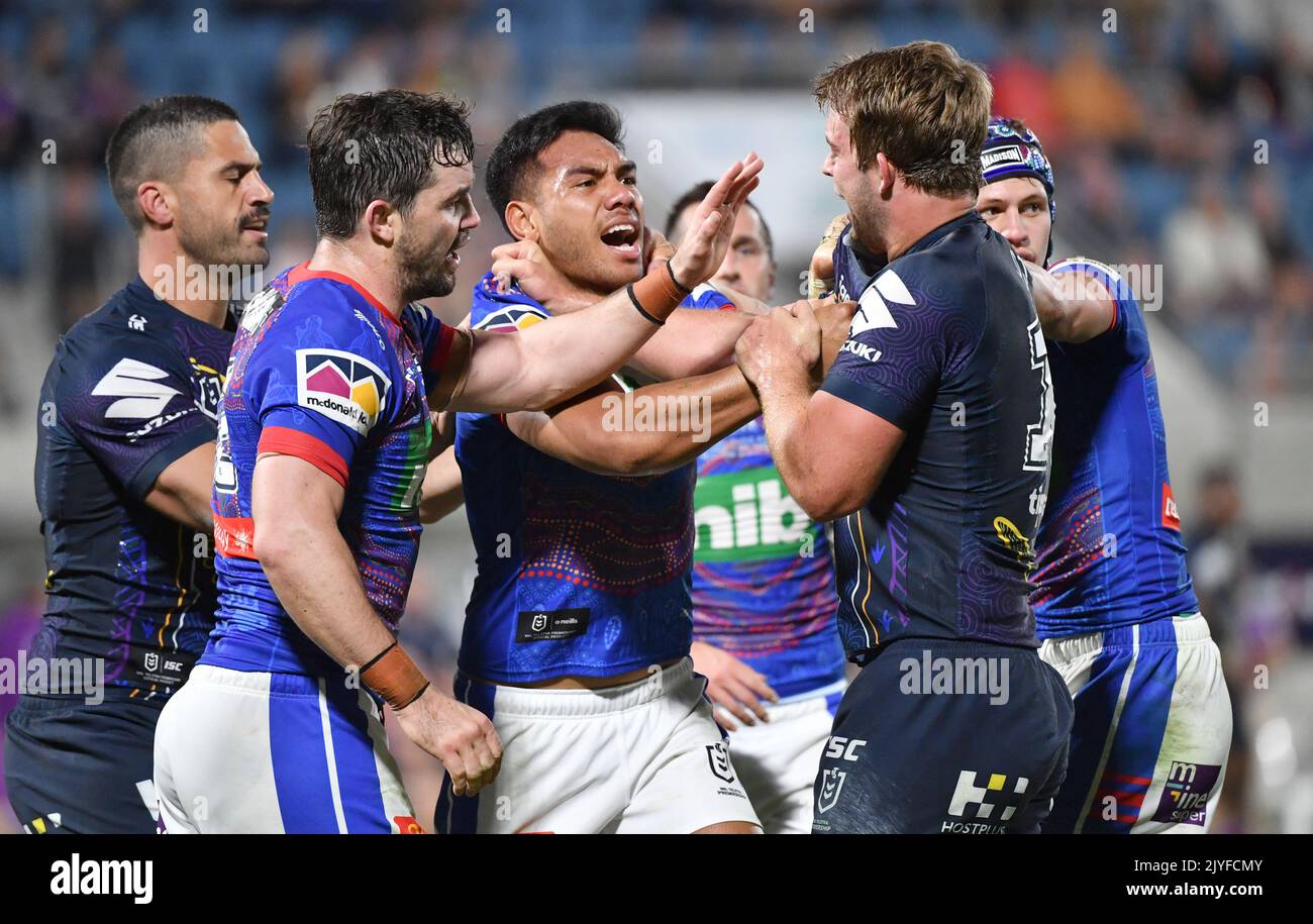 Aidan Guerra and Hymel Hunt of the Knights grapple with Christian Welch ...