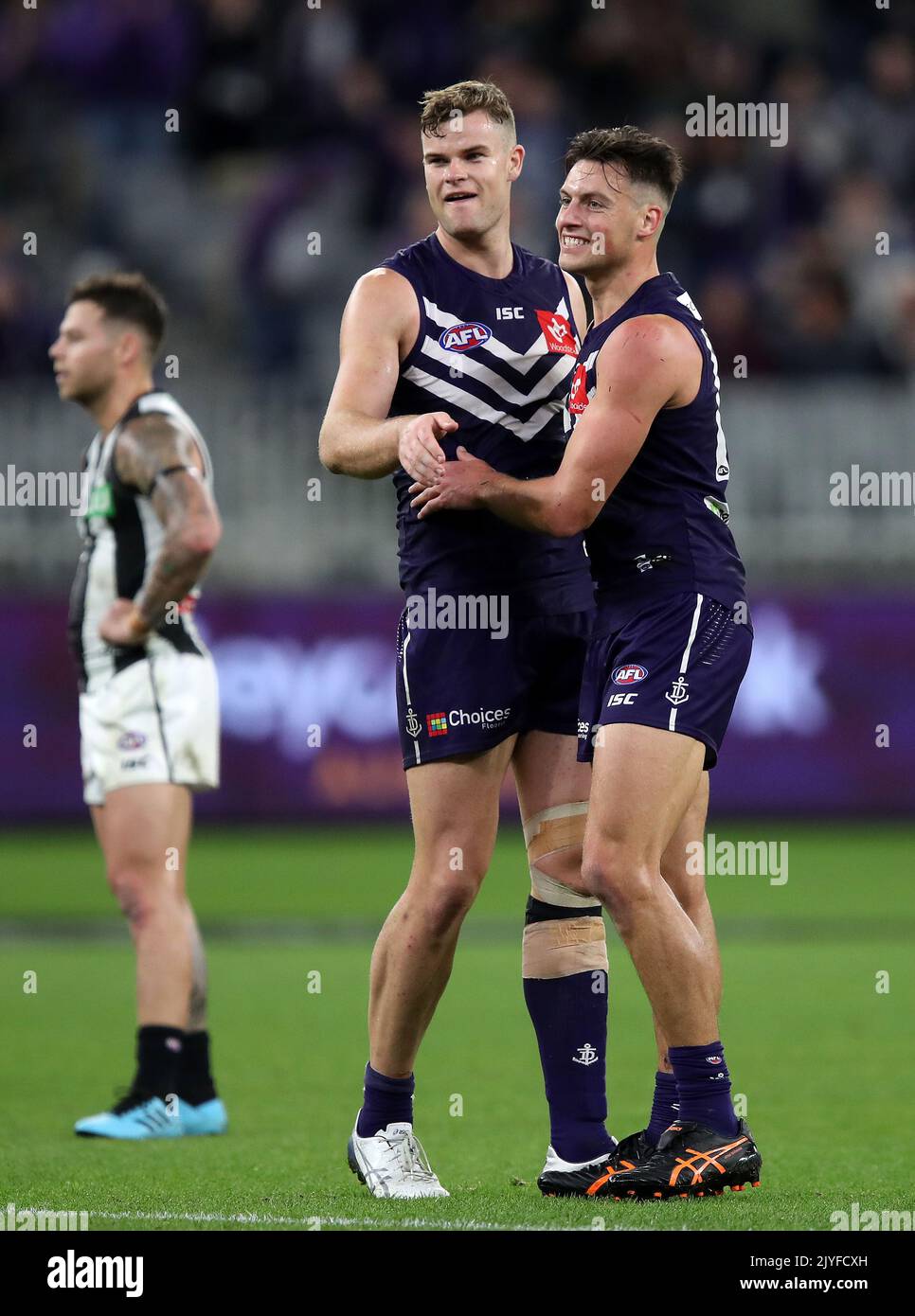 Sean Darcy and Ethan Hughes of the Dockers celebrate at the final siren ...