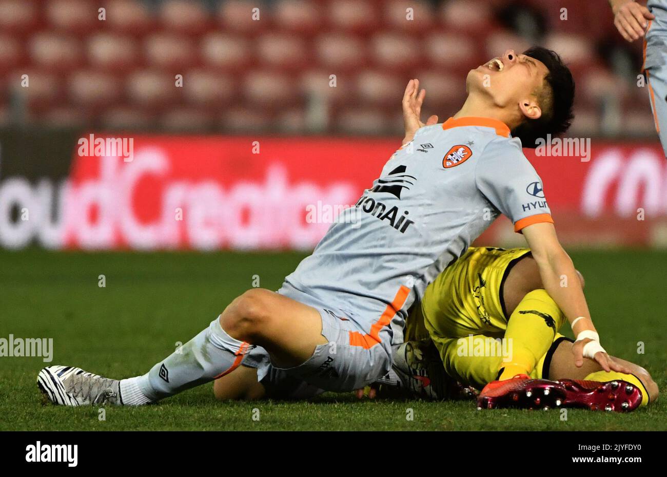 Brisbane Roar Danny Kim is fouled during the Round 28 A-League match ...