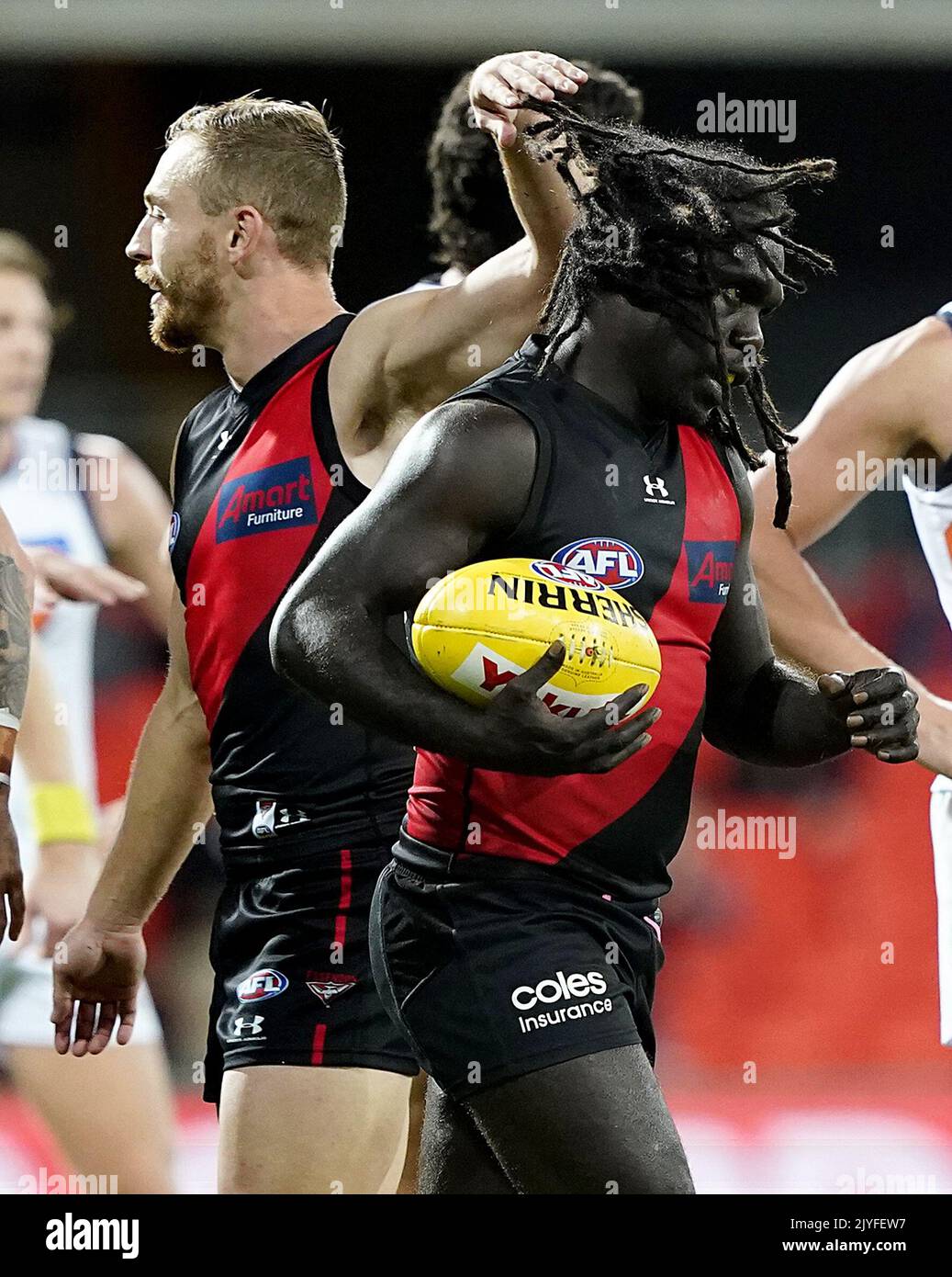 Devon Smith of the Bombers (left) reacts with Anthony McDonald ...