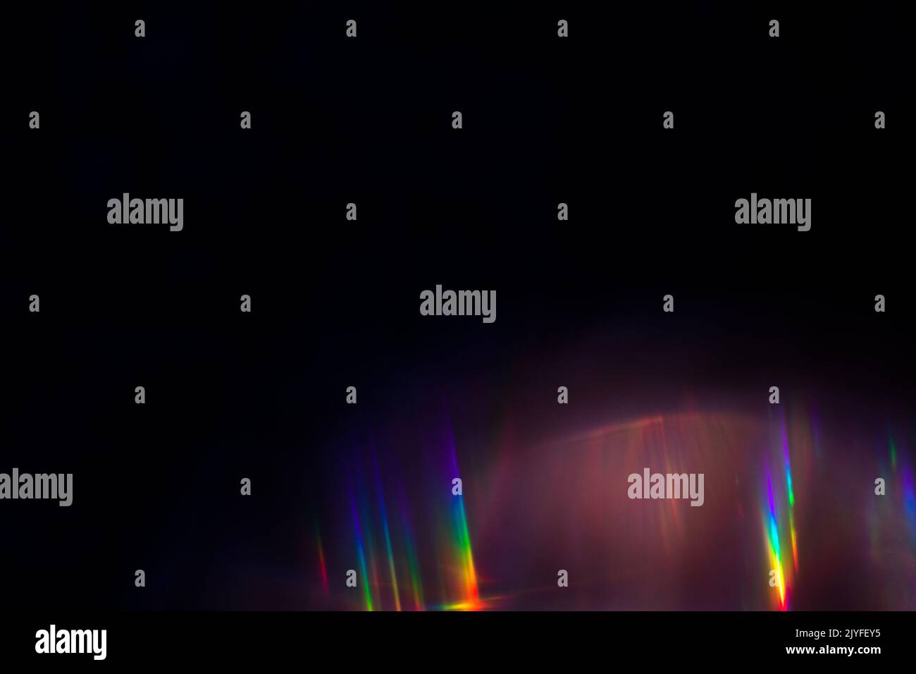 colorful rainbow crystal light leaks on black background Stock Photo ...