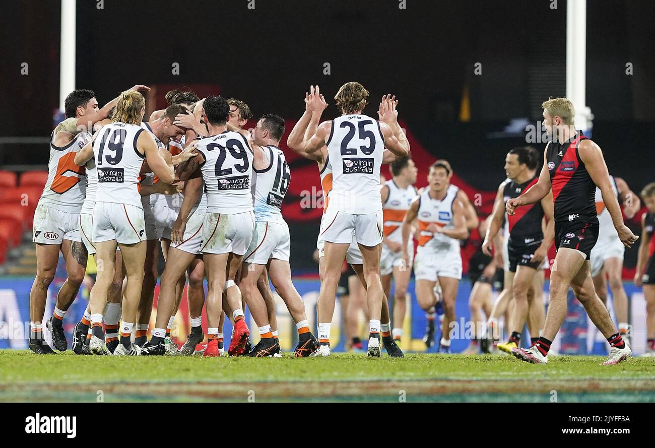 Callan Ward of the Giants reacts with players after kicking a goal ...