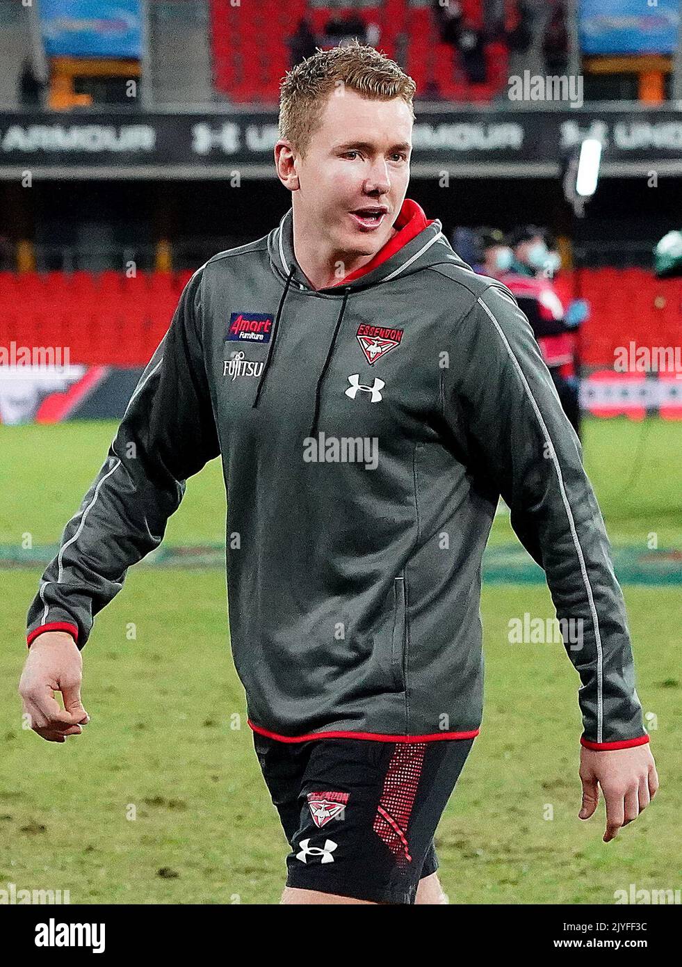 Jacob Townsend of the Bombers is seen with a swollen face following the Round 10 AFL match ...