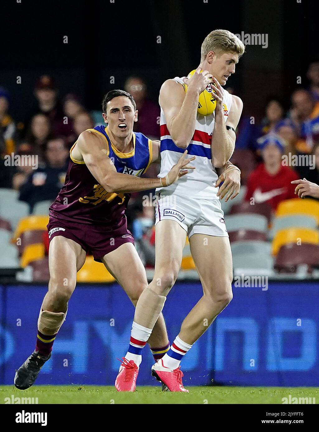 Tim English of the Bulldogs (right) takes a mark during the Round 11 ...