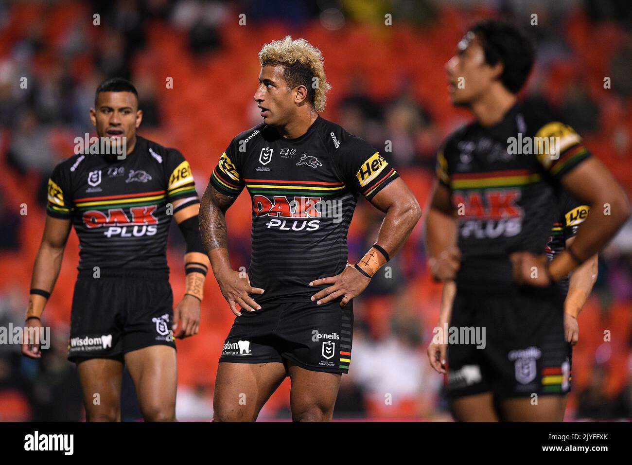 Villiame Kikau of the Panthers (centre) looks on during the Round 13 ...