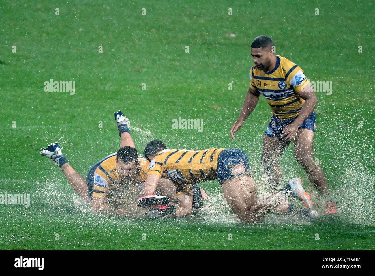 Sharks Connor Tracey is tackled during the Round 13 NRL match between ...
