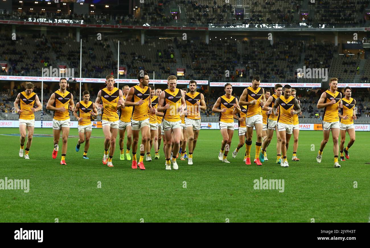 The Hawks team leave the field at the half time break during the Round ...