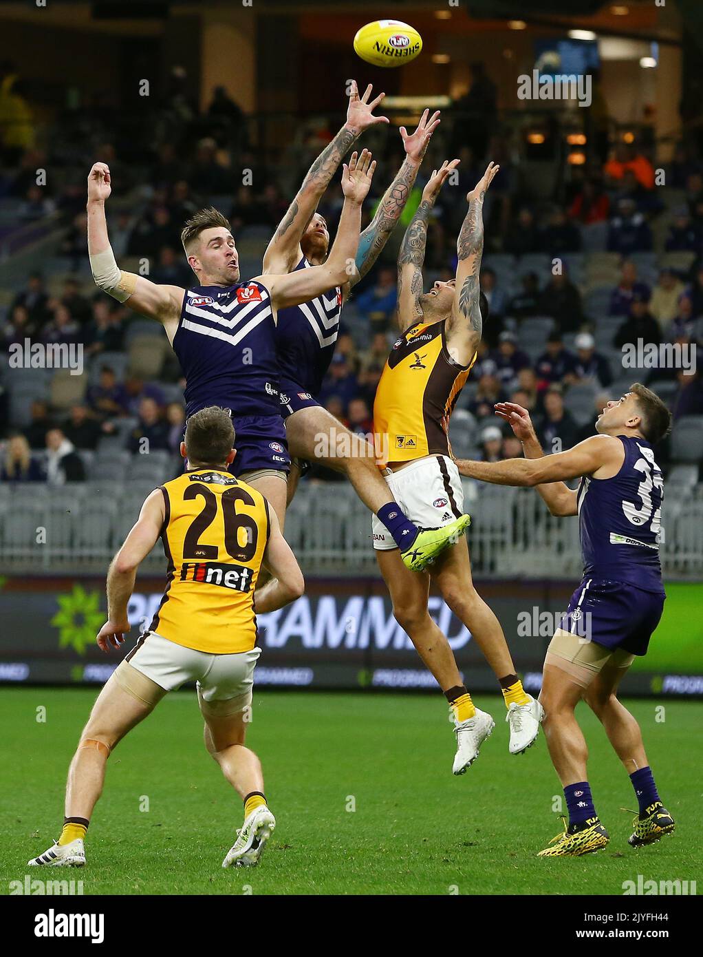 Luke Ryan and Nathan Wilson of the Dockers challenges to take a mark ...