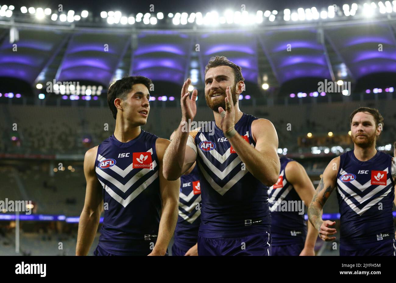 Connor Blakely of the Dockers claps the fans at the end of the game ...