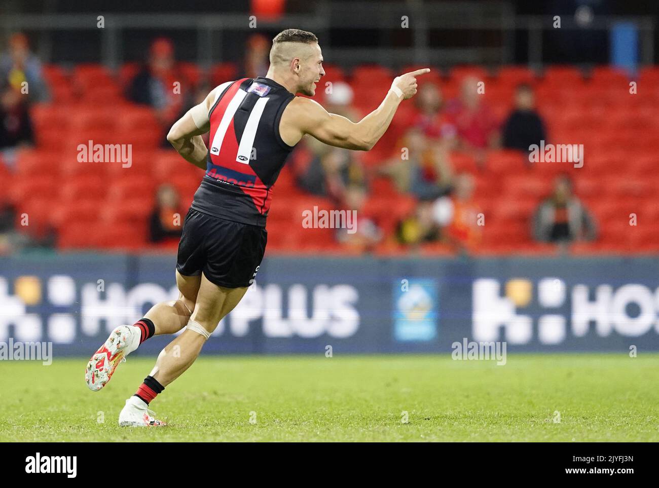 David Zaharakis of the Bombers celebrates after kicking a goal during ...