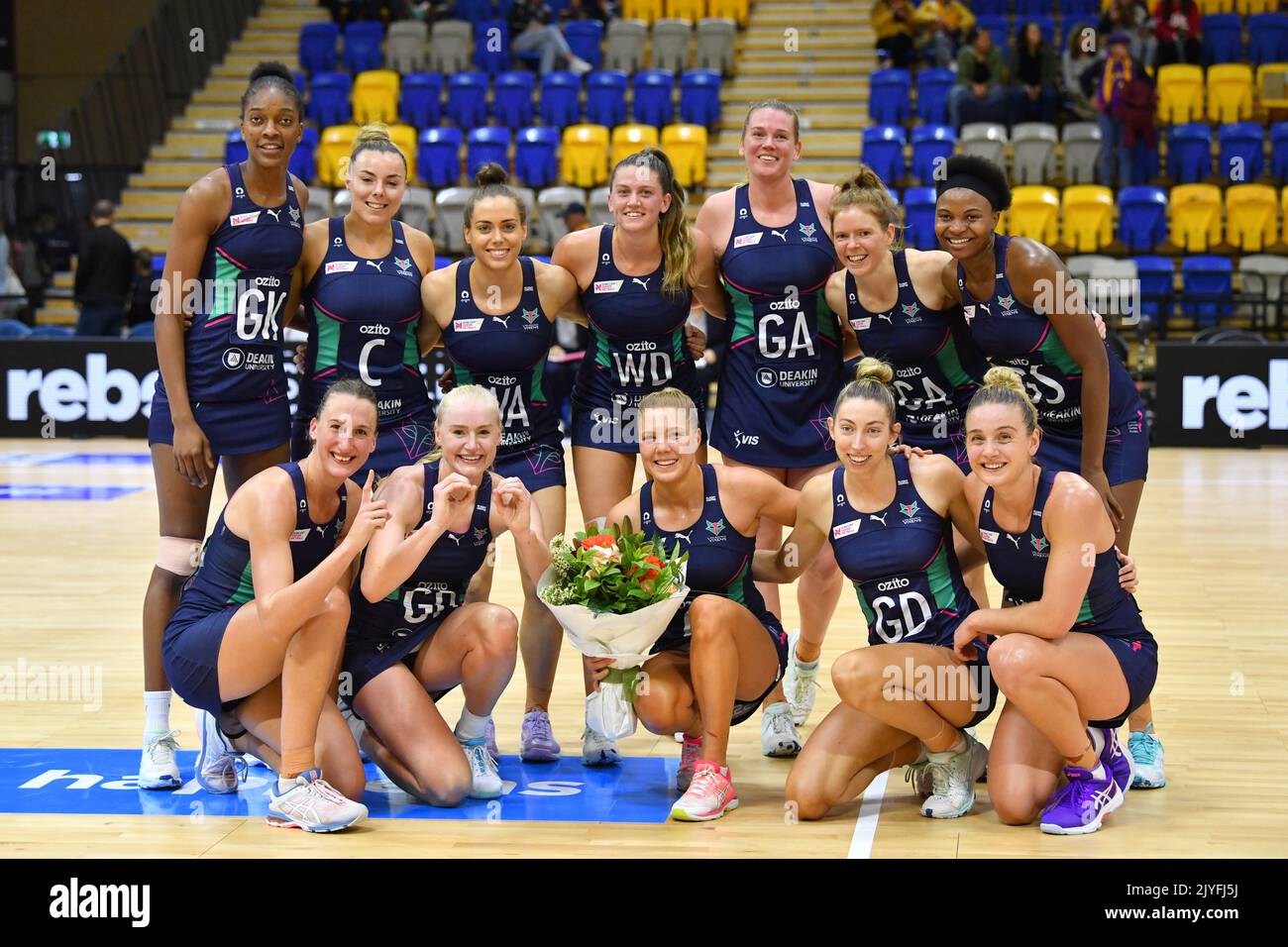 Kate Moloney (centre) of the Vixens celebrates with her team mates to ...