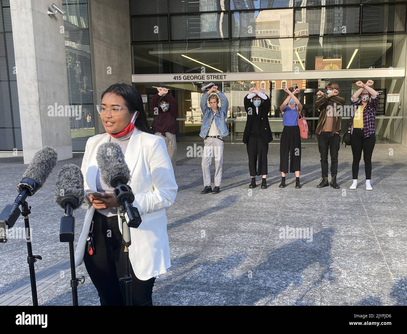 Refugee protest organiser Dane de Leon speaks to media after the ...