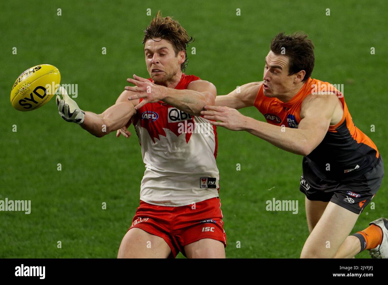 Jeremy Cameron of the Giants tackles Dane Rampe of the Swans during ...