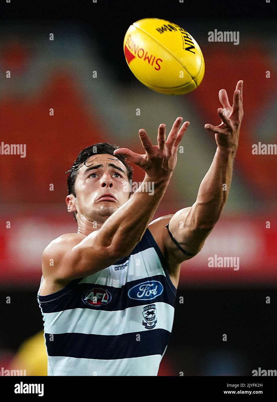 Sam Simpson of the Cats taking a mark during the Round 12 AFL match ...