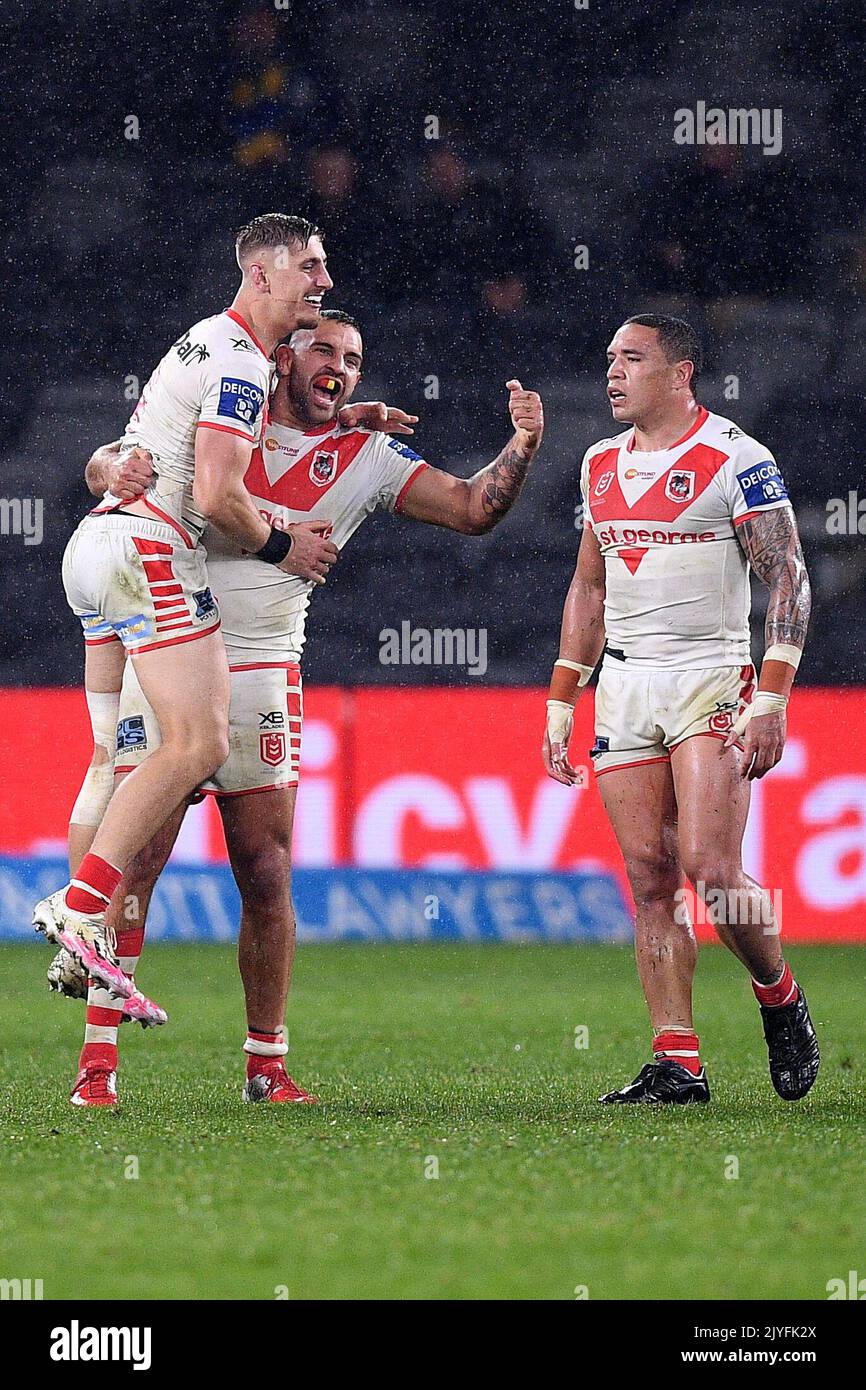 Zac Lomax and Josh Kerr of the Dragons celebrate their win following ...