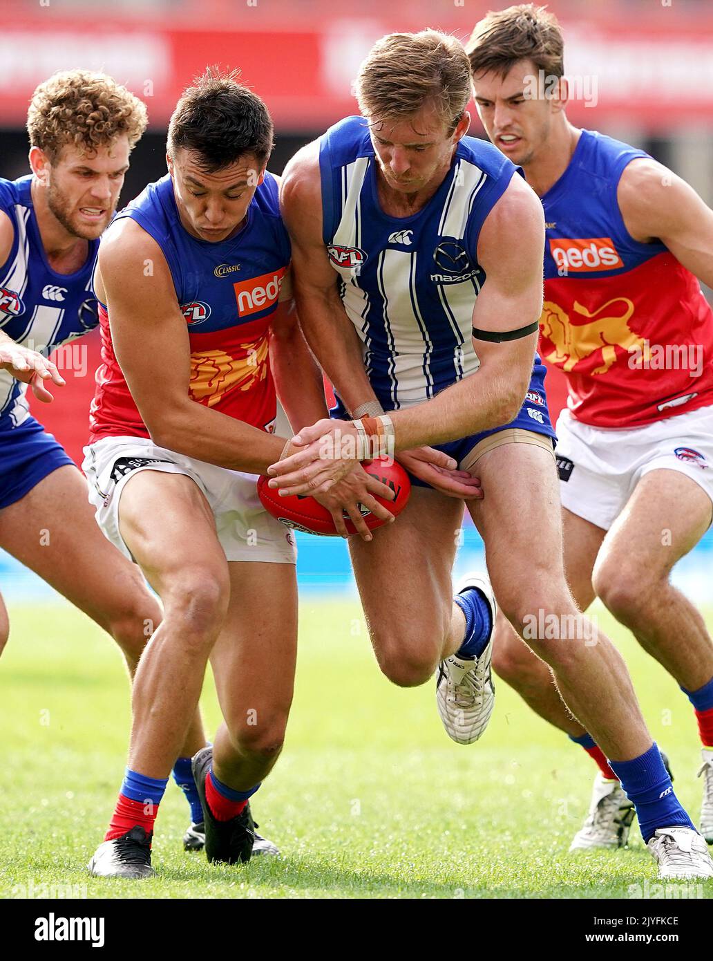 Hugh McCluggage of the Lions (left) competes with Sam Durdin of the ...