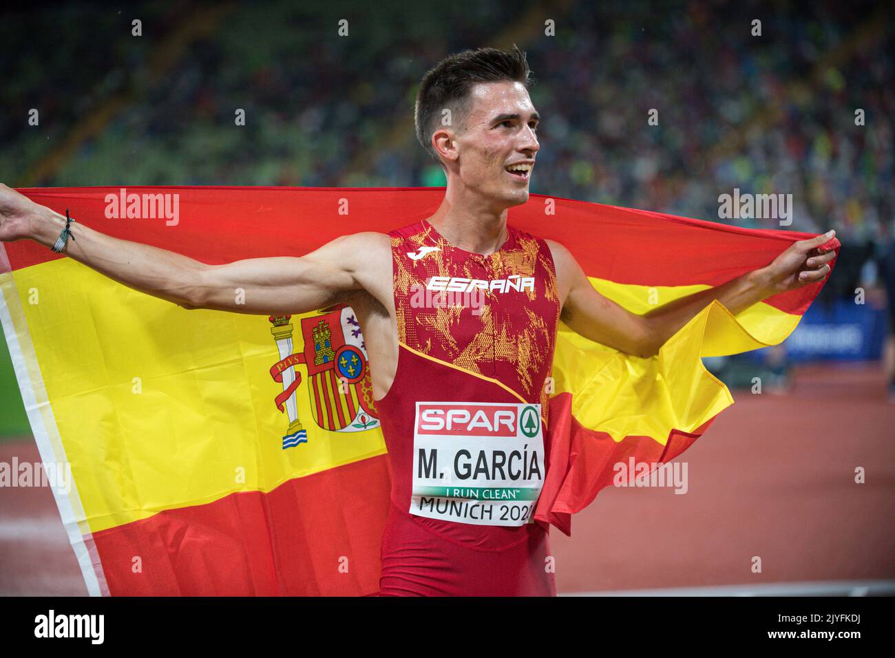 Mario García Romo with her country's flag at the European Athletics ...