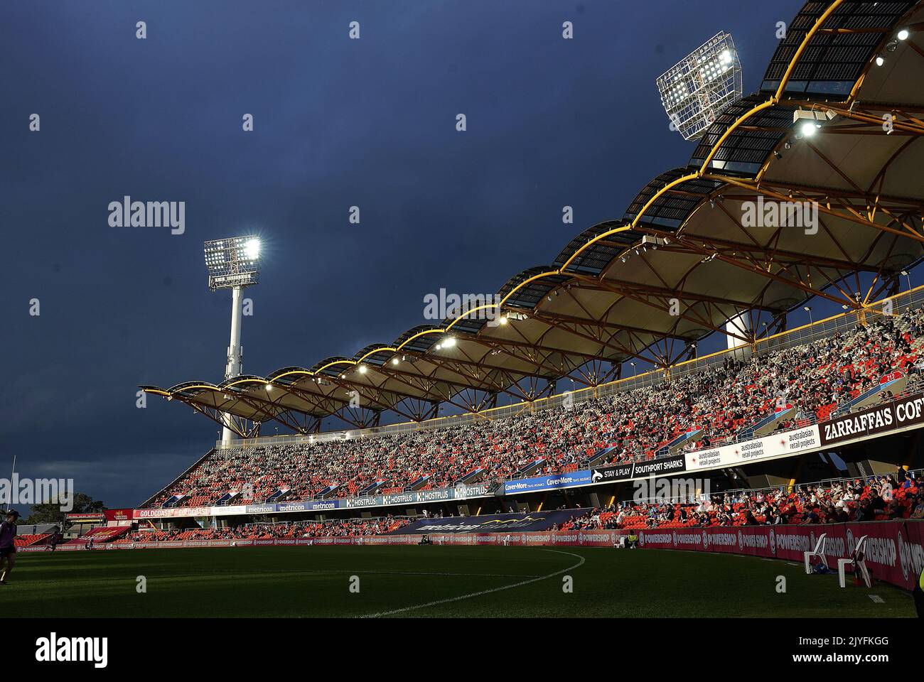 Spectators look on during the Round 12 AFL match between the Brisbane ...