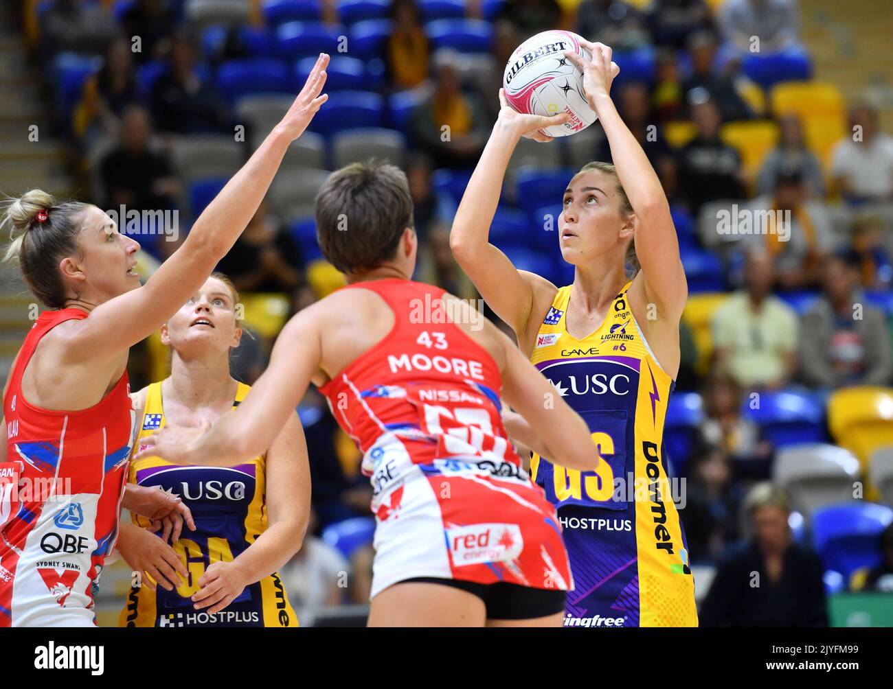 Cara Koenen (right) of the Lightning shoots for goal during the Round 4 ...