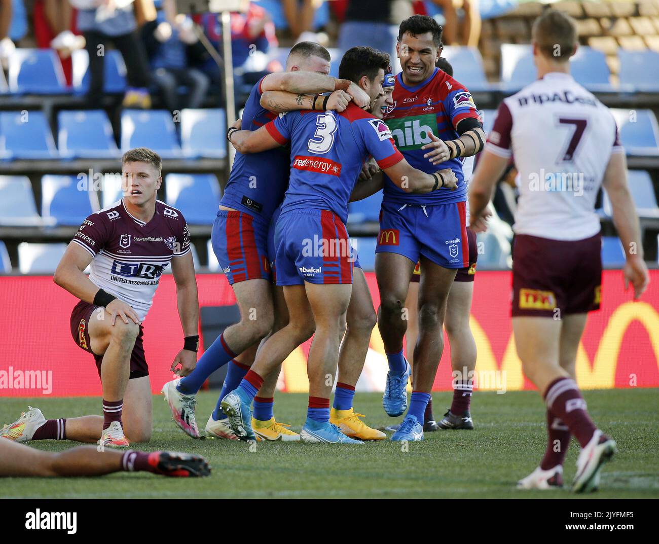 Enari Tuala of the Knights celebrates scoring a second half try during ...
