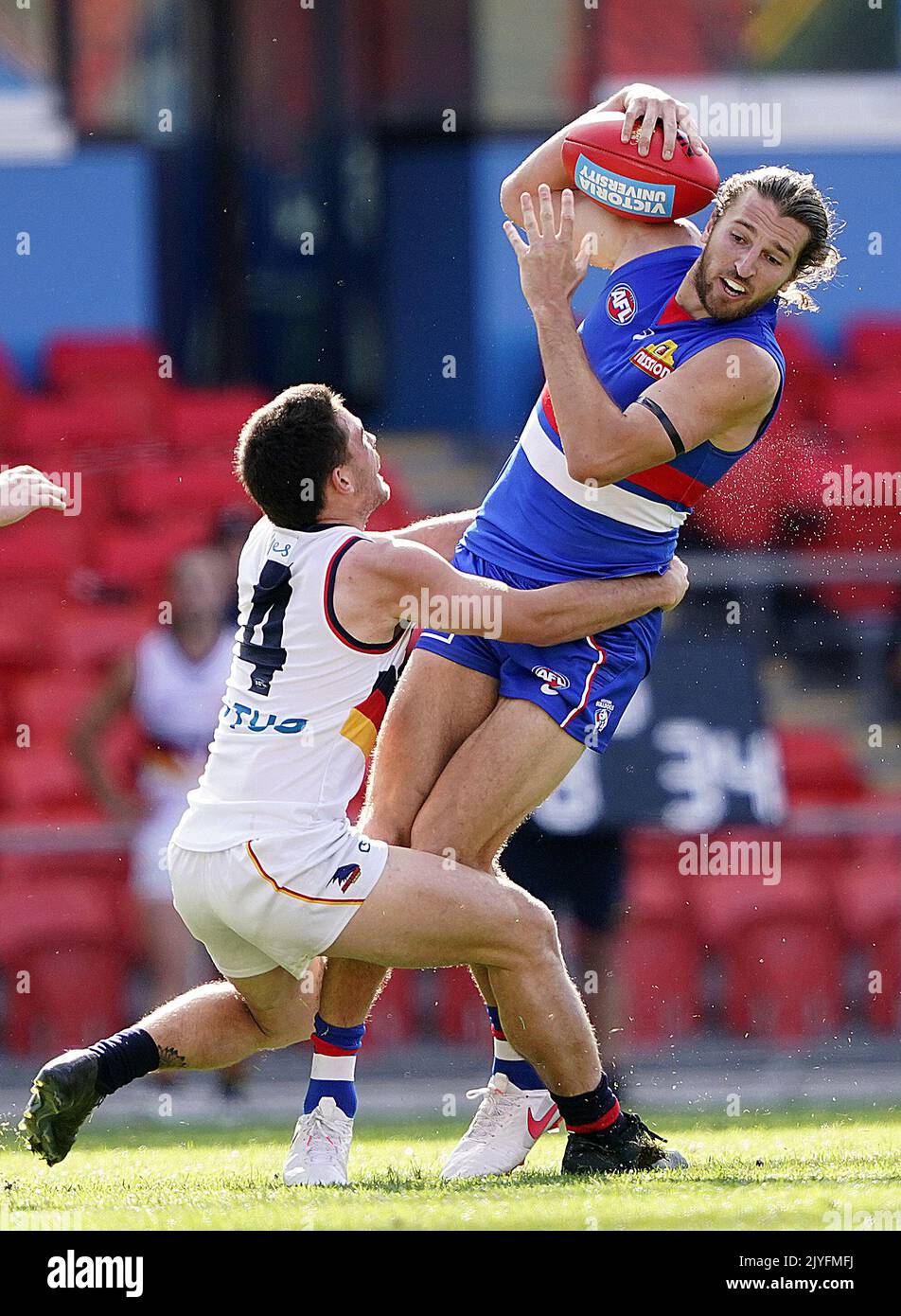 Lachlan Murphy of the Crows attempts to tackle Marcus Bontempelli of ...