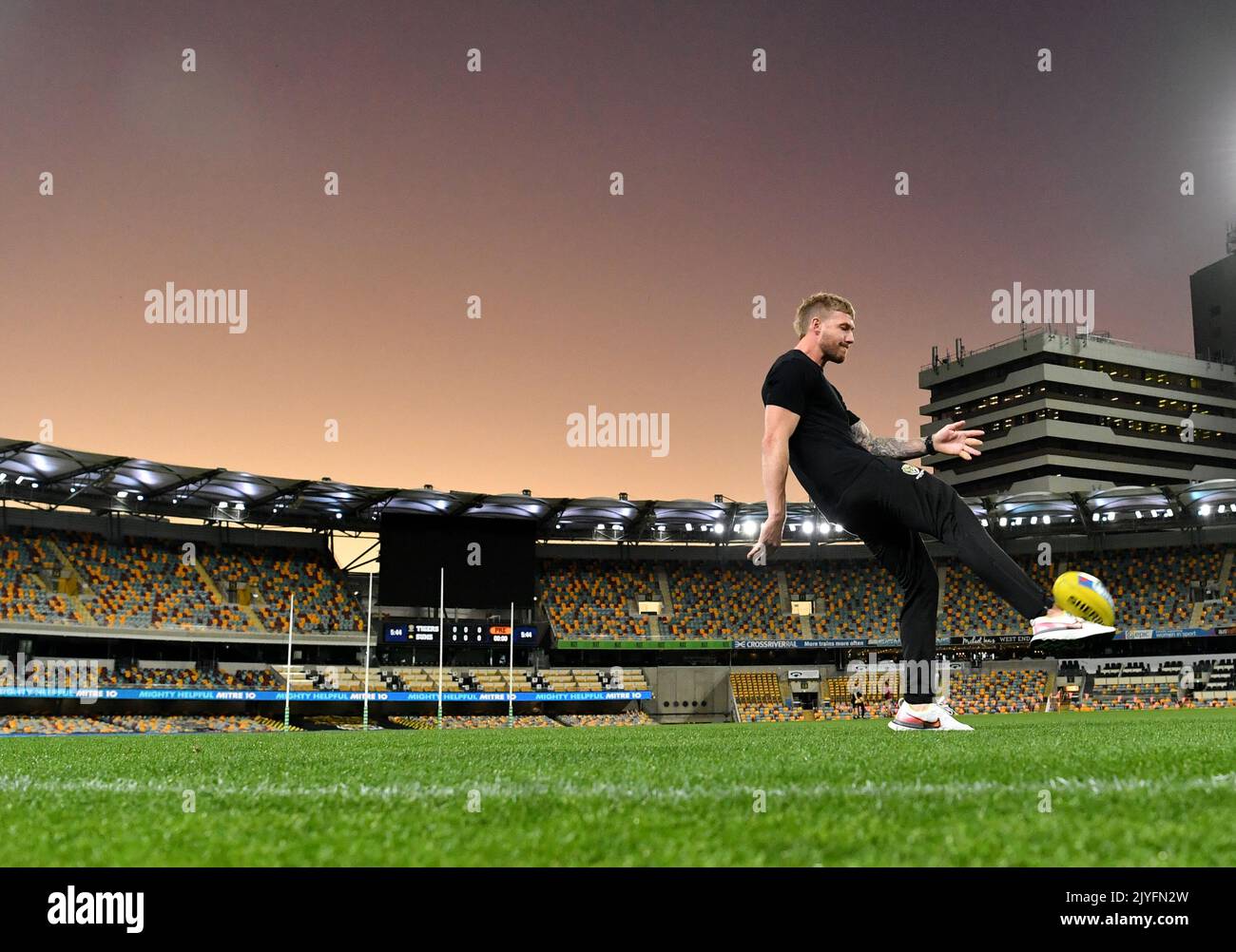 Nathan Broad of the Tigers is seen warming up before the Round 12 AFL ...