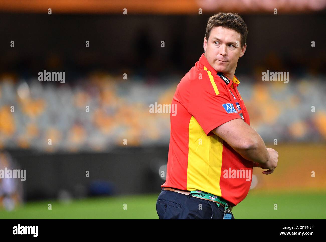 Suns coach Stuart Dew is seen before the Round 12 AFL match between the ...