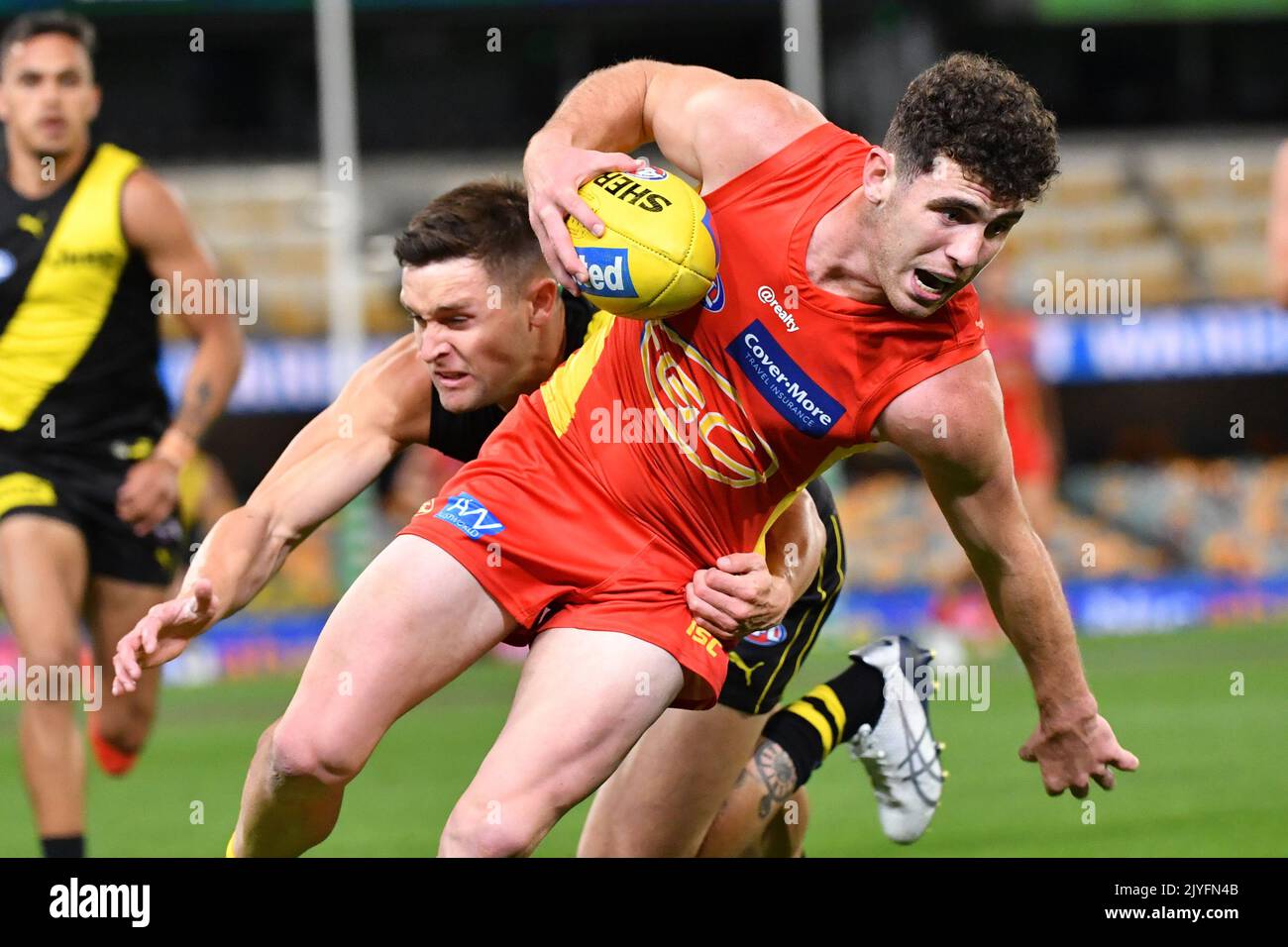 Sam Flanders (right) of the Suns in action during the Round 12 AFL ...