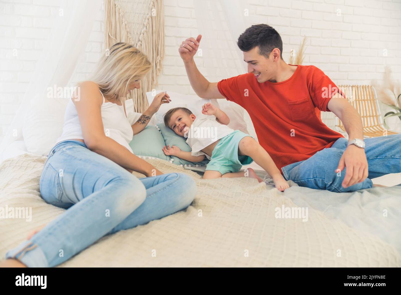 Time son tickling two hi-res stock photography and images - Alamy