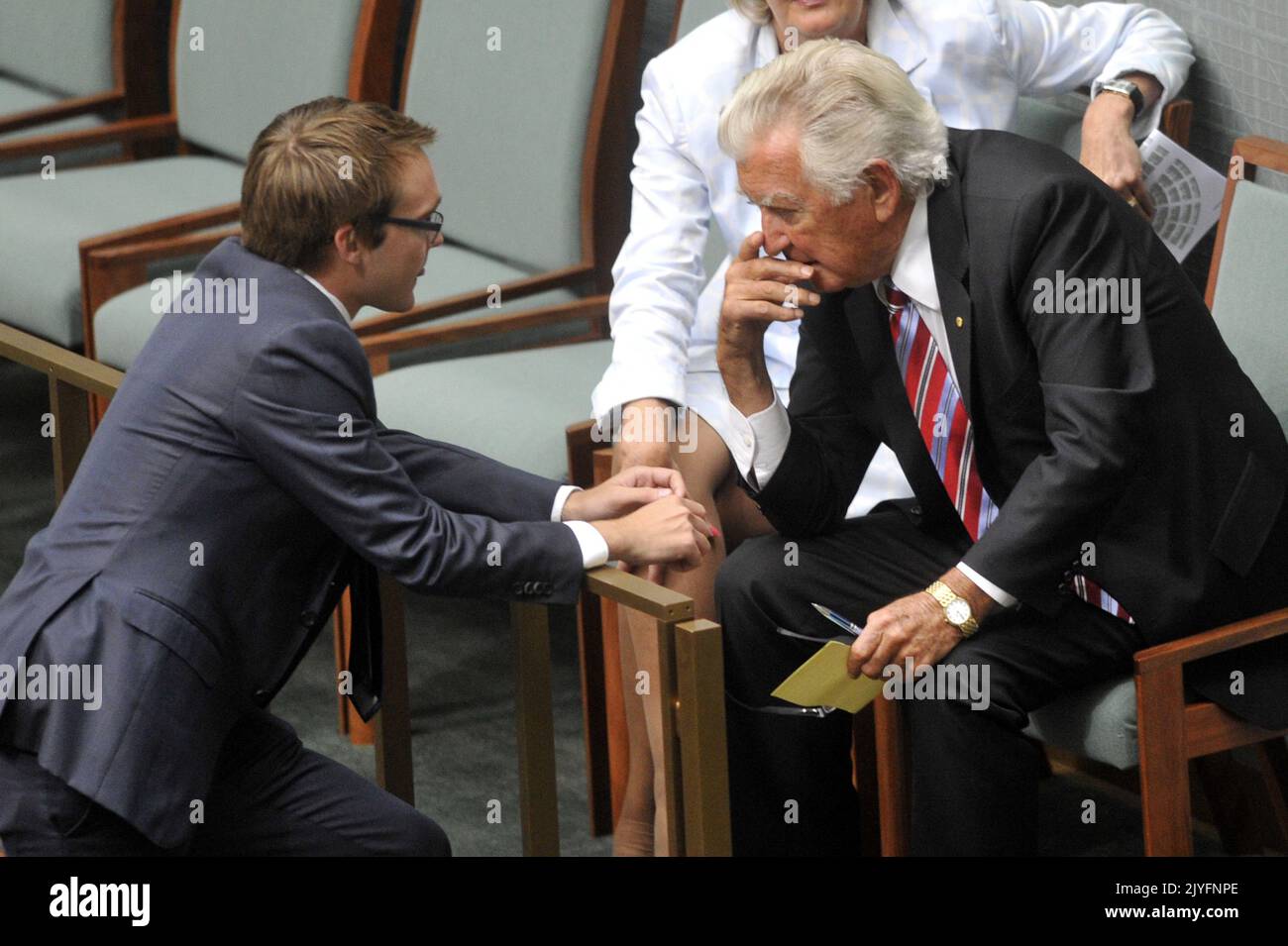 Former Prime Minister Bob Hawke speaks to the youngest member of ...