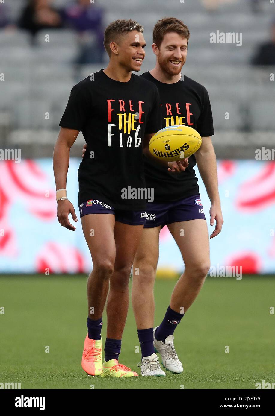 Liam Henry of the Dockers chats to Reece Conca of the Dockers before ...