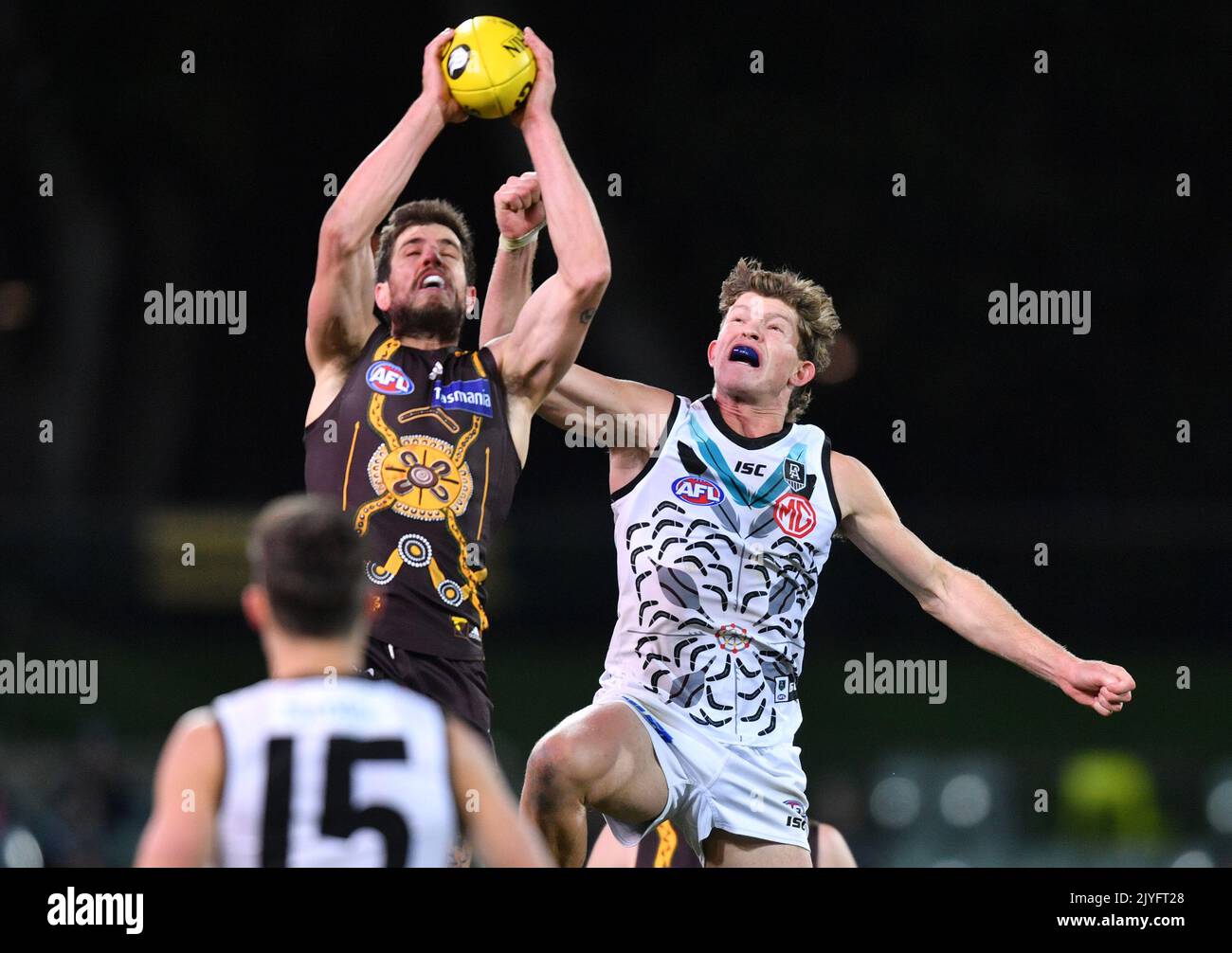 Ben Stratton of the Hawks and Mitchell Georgiades of the Power during ...