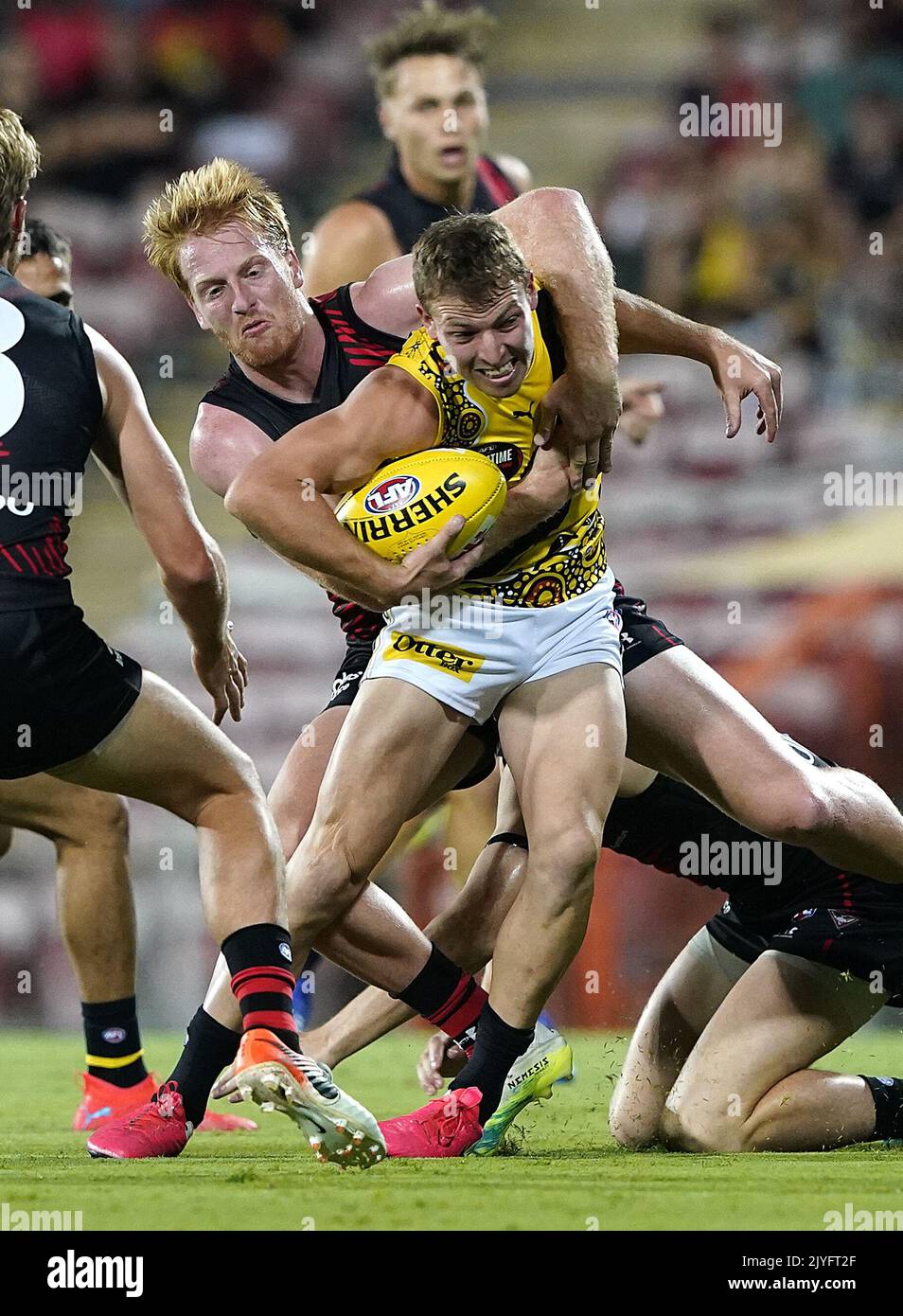 Aaron Francis of the Bombers tackles Jake Aarts of the Tigers during ...