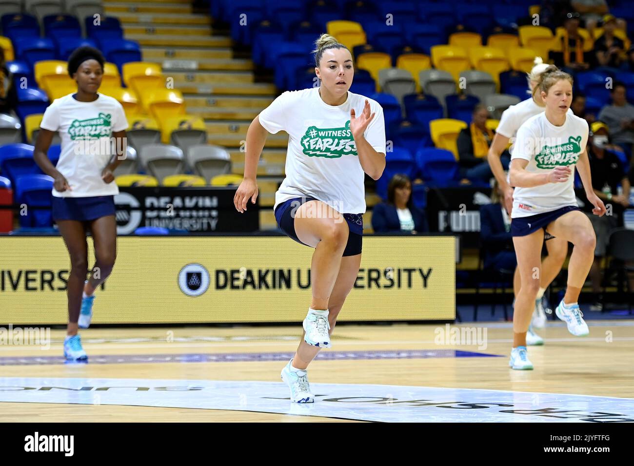 Elle McDonald of the Vixens (centre) warms up during the Round 6 Super ...